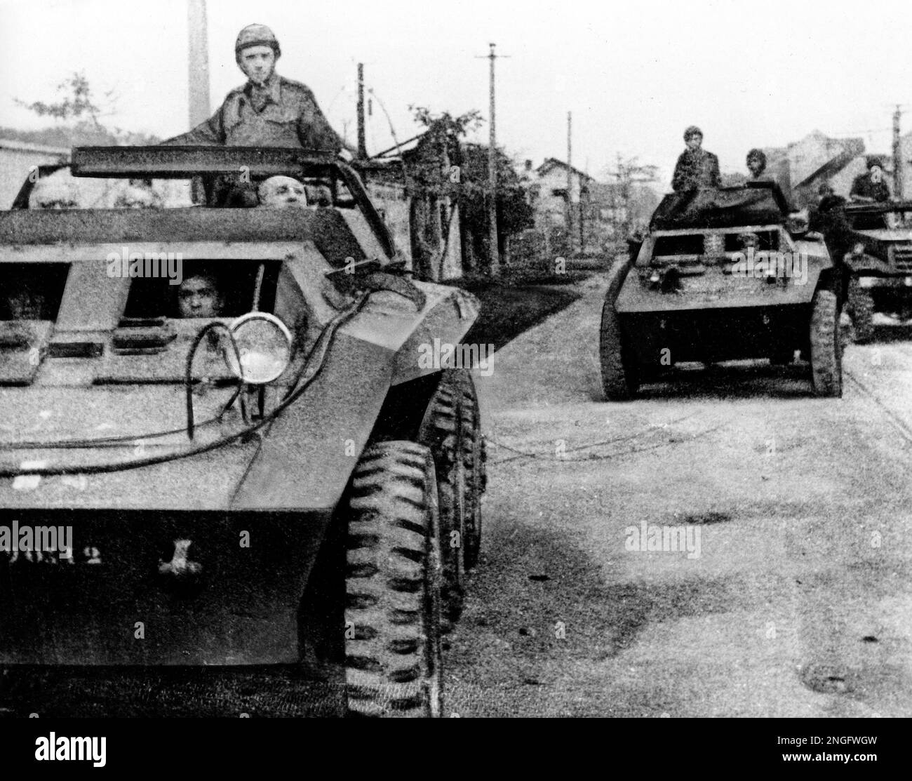 Armored vehicles of the French-Indochinese Union army are rumbling ...