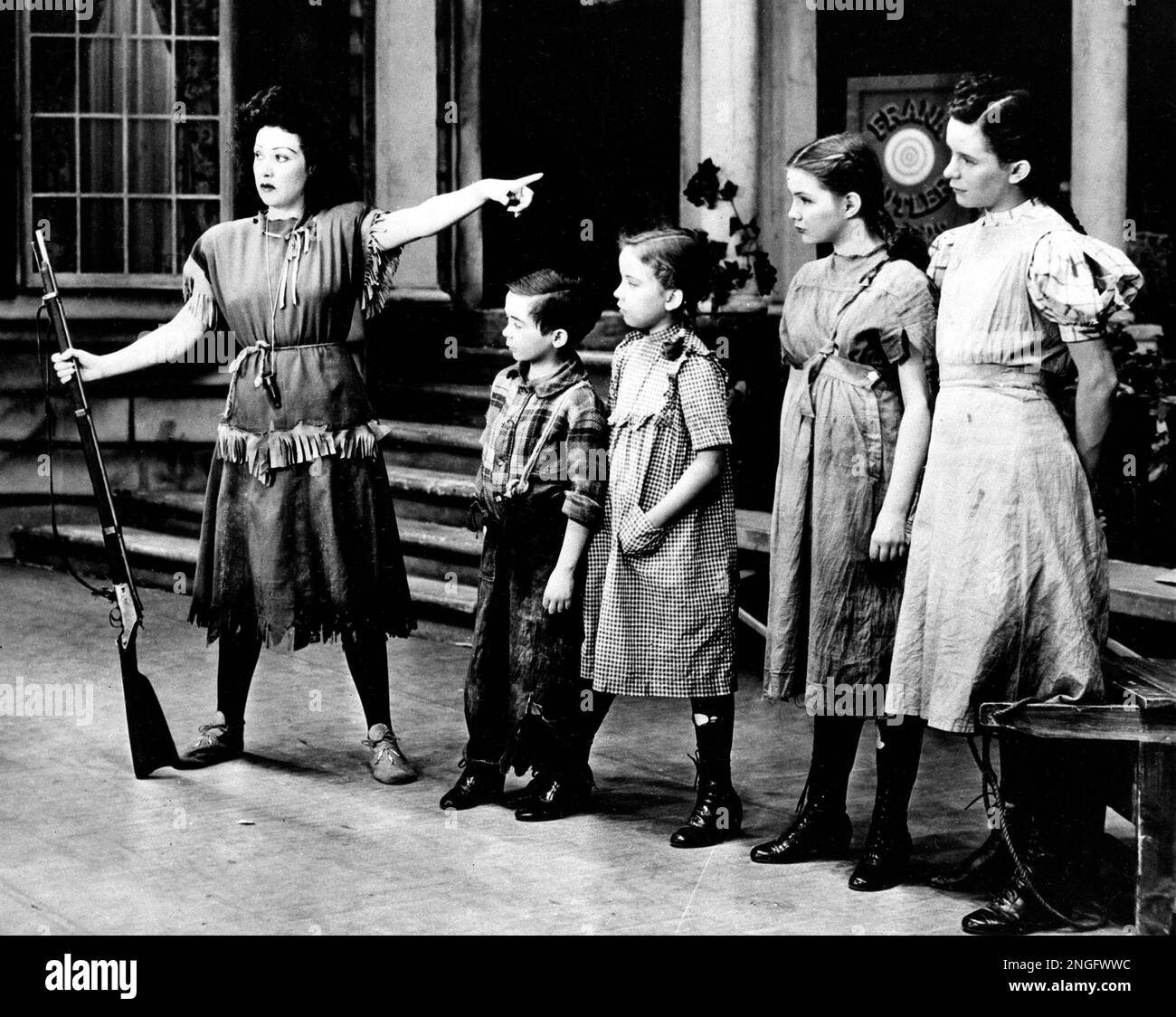 Ethel Merman is Annie Oakley, famed lady sharpshooter, in the premiere ...