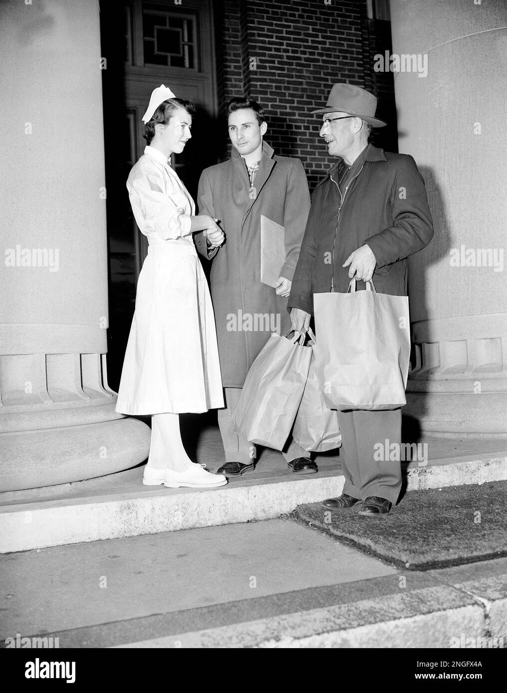 Ronald Herrick, of Northboro, Mass., says goodbye to nurse Barbara Fisk ...