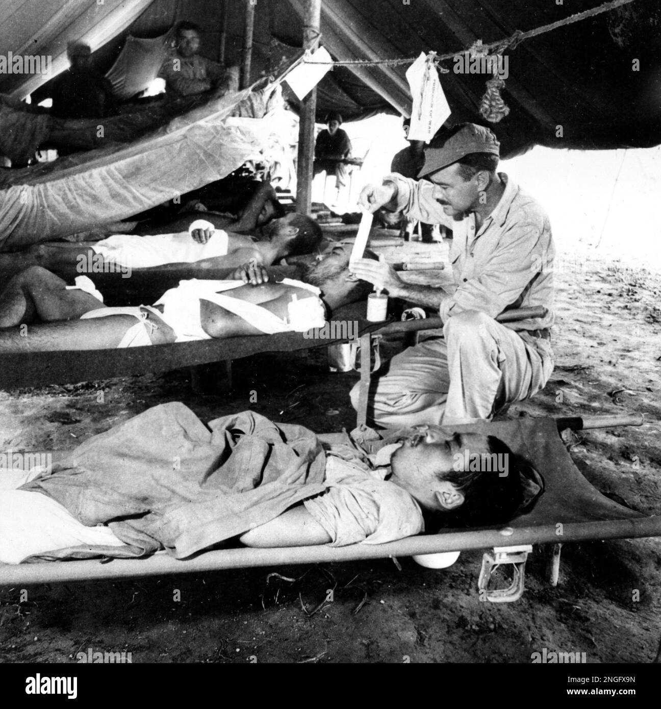 Hollywood actor Lew Ayres, a conscientious objector who is a noncombatant medic in the ...