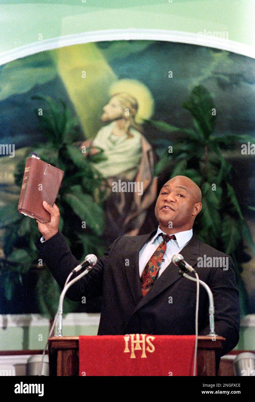 Heavyweight boxer and Texas preacher George Foreman holds the Bible in ...