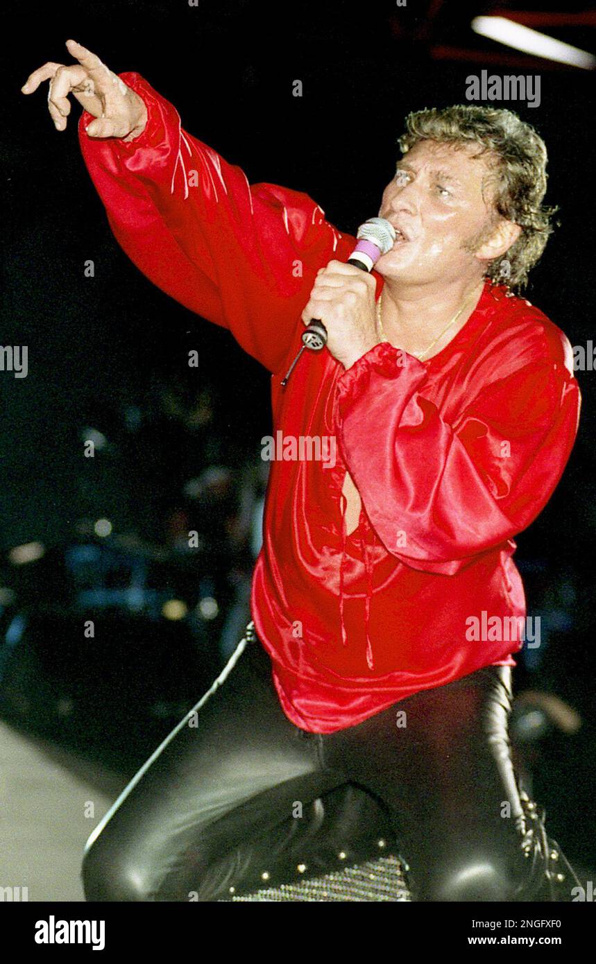 French rock star Johnny Hallyday performs during his 50th birthday ...