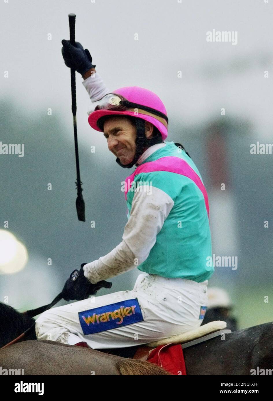 Jockey Jerry Bailey celebrates aboard Empire Maker after winning the ...