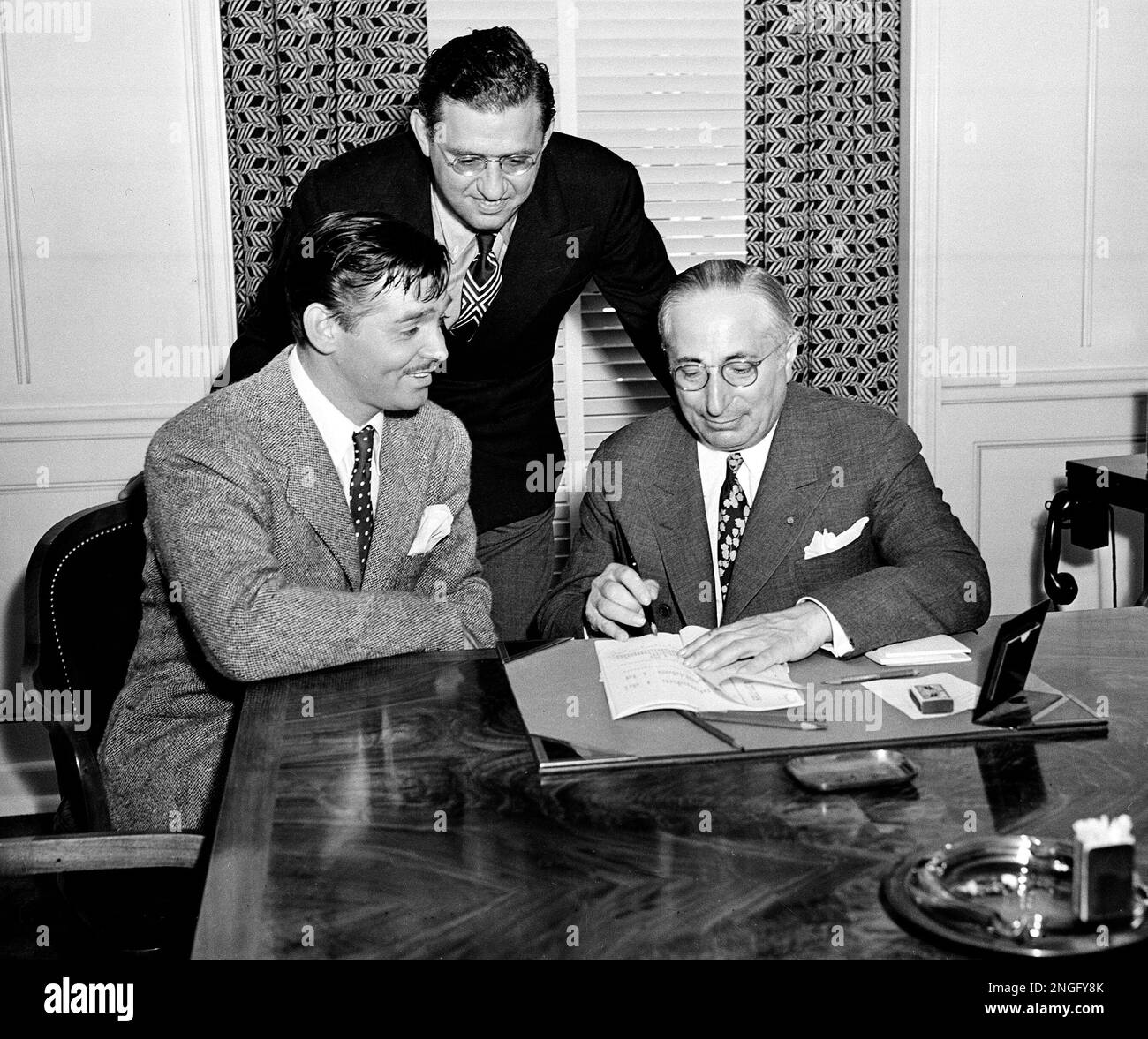 Actor Clark Gable, left, producer David O. Selznick, center, and MGM ...