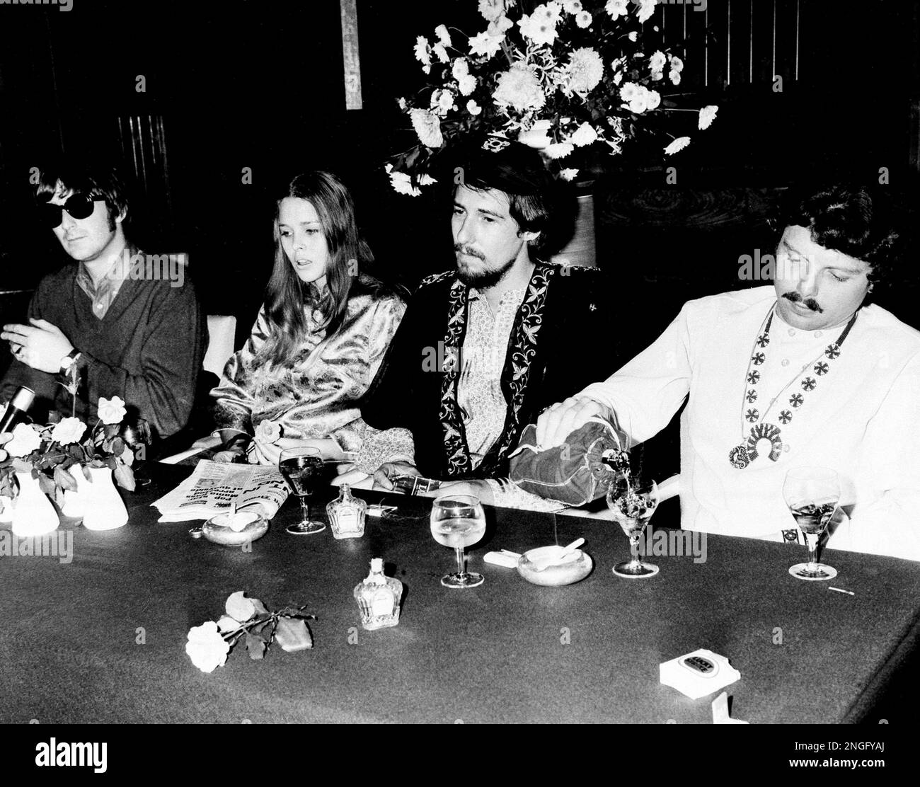 Three members of the American pop group The Mamas and the Papas and ...