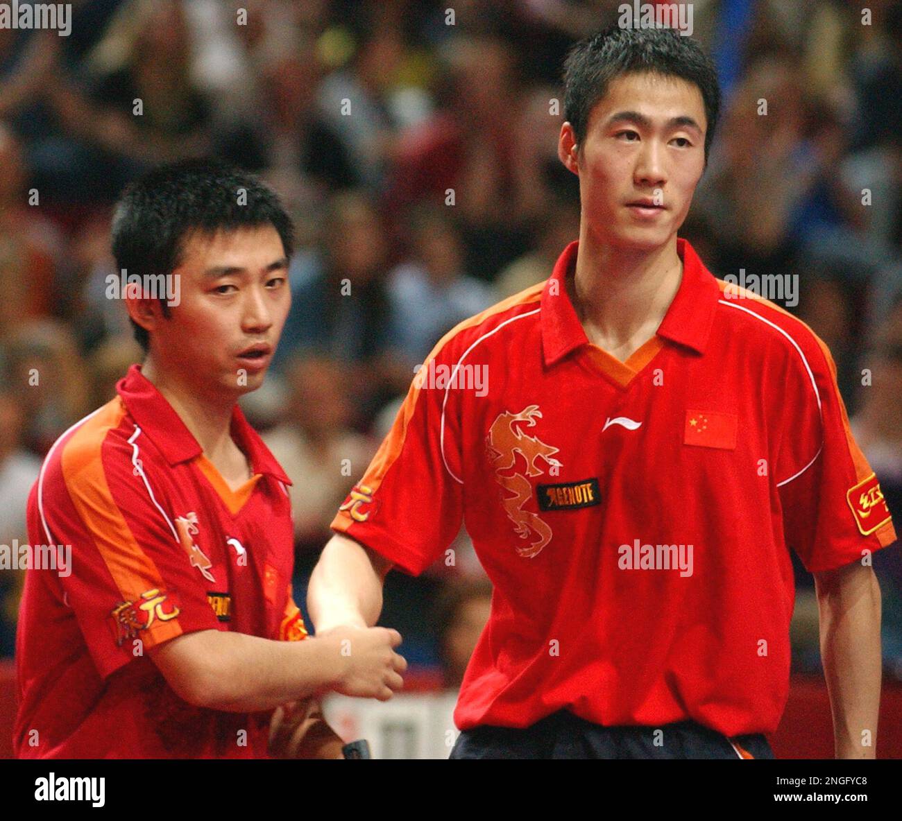 Republic of China players Liqin Wang, right, and Sen Yan, congratulate ...