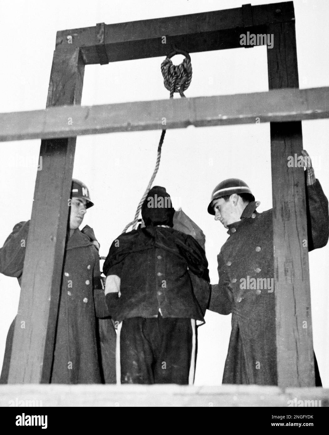 The noose is placed over the hooded head of Philip Gutlich for the ...