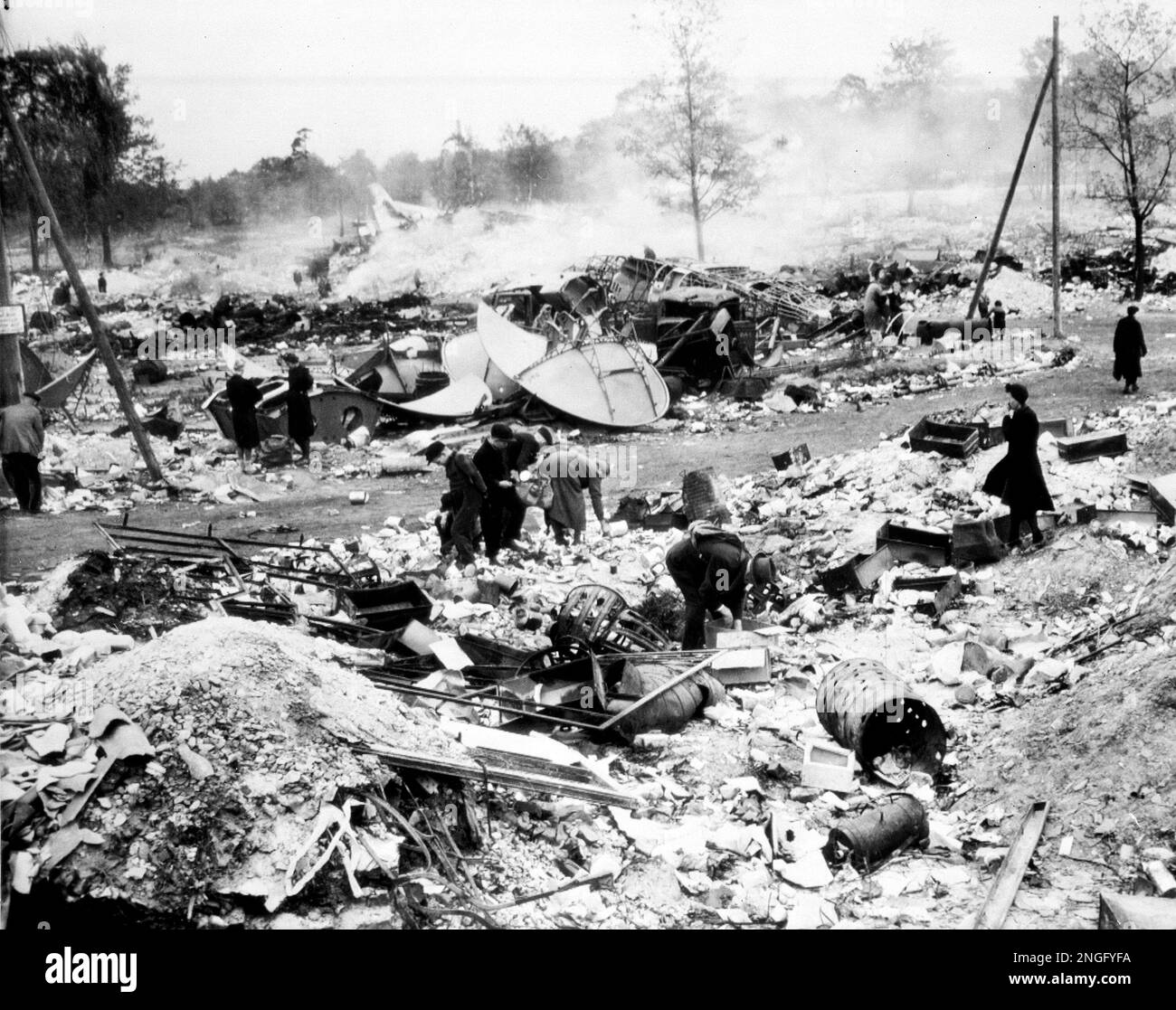Residents of Berlin hunt through a dumping ground near Tempelhof ...
