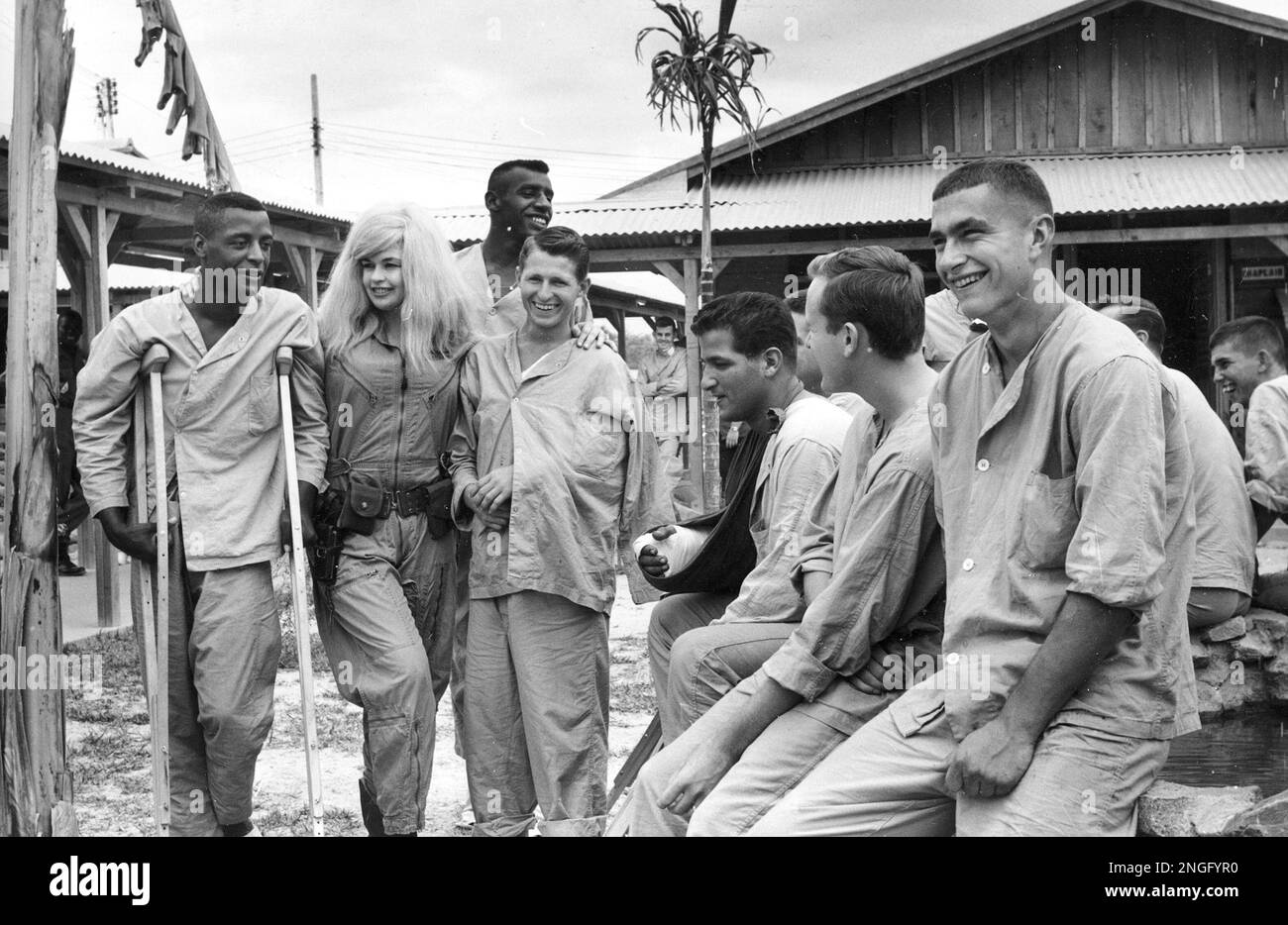 Actress Jayne Mansfield visits with wounded American soldiers at the ...