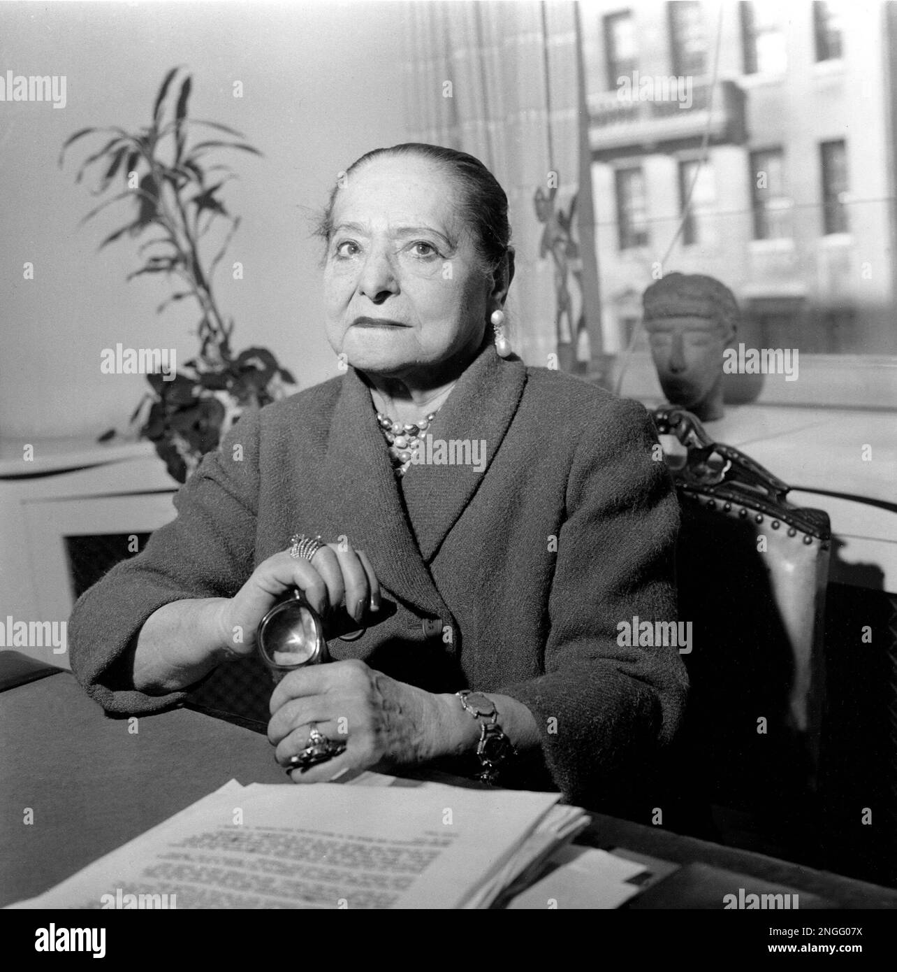 Businesswoman Helena Rubinstein is shown in her New York City office on ...