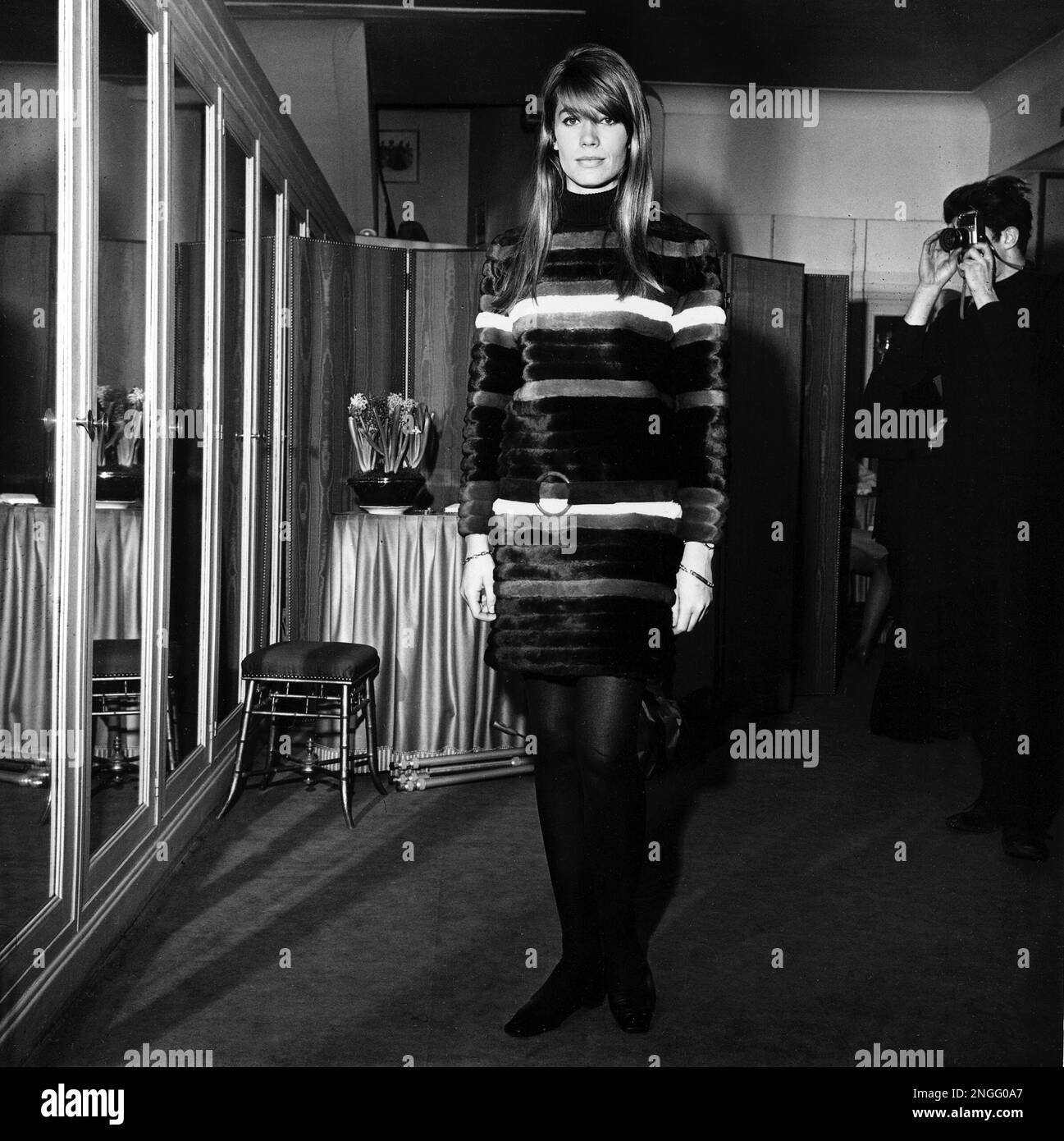 French singer and actress Francoise Hardy wears a summer fur dress ...