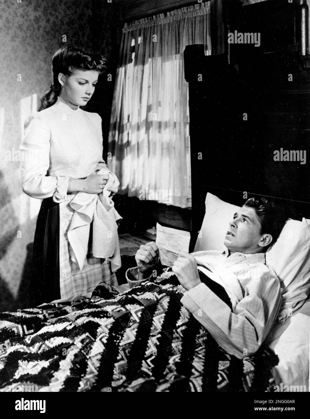 Actress Ann Sheridan and actor Ronald Reagan are seen in 1942, in a ...