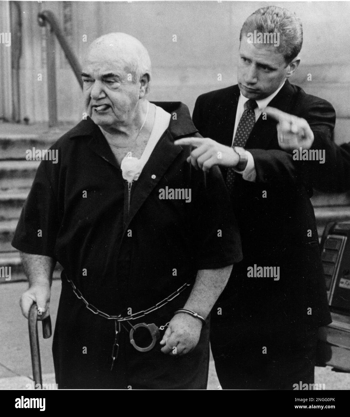 Anthony "Fat Tony" Salerno, left, is led by deputy U.S. marshals to a ...