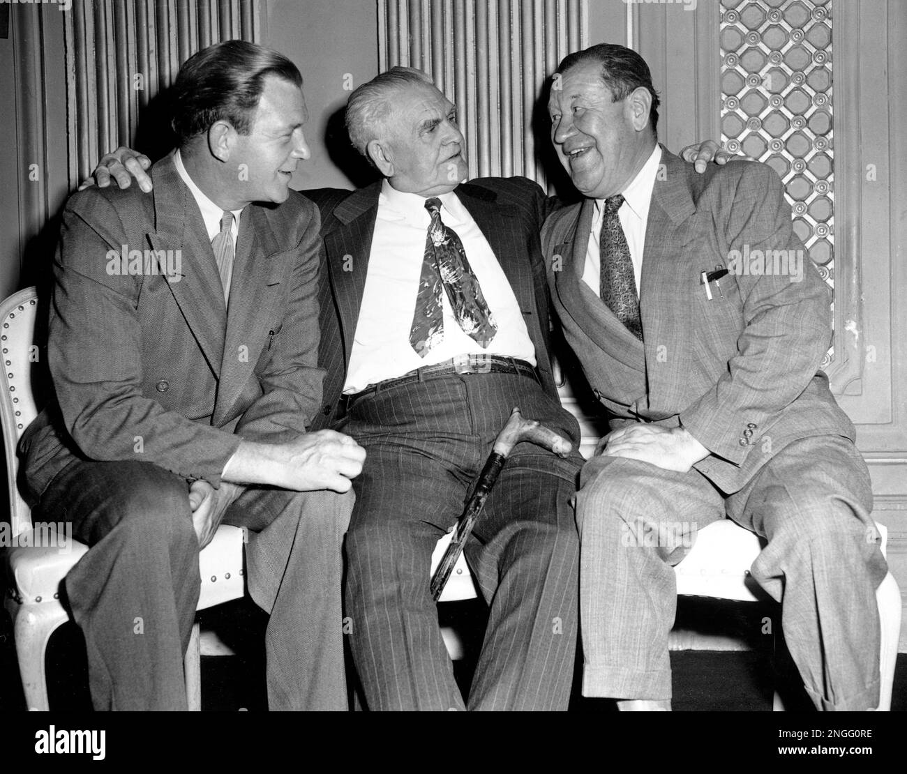 Glenn S. "Pop" Warner, former football coach, chats with two of his ...