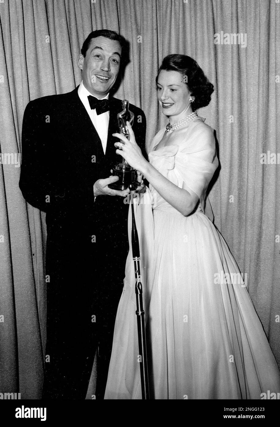 Actress Deborah Kerr poses with Oscar winner and director John Huston ...