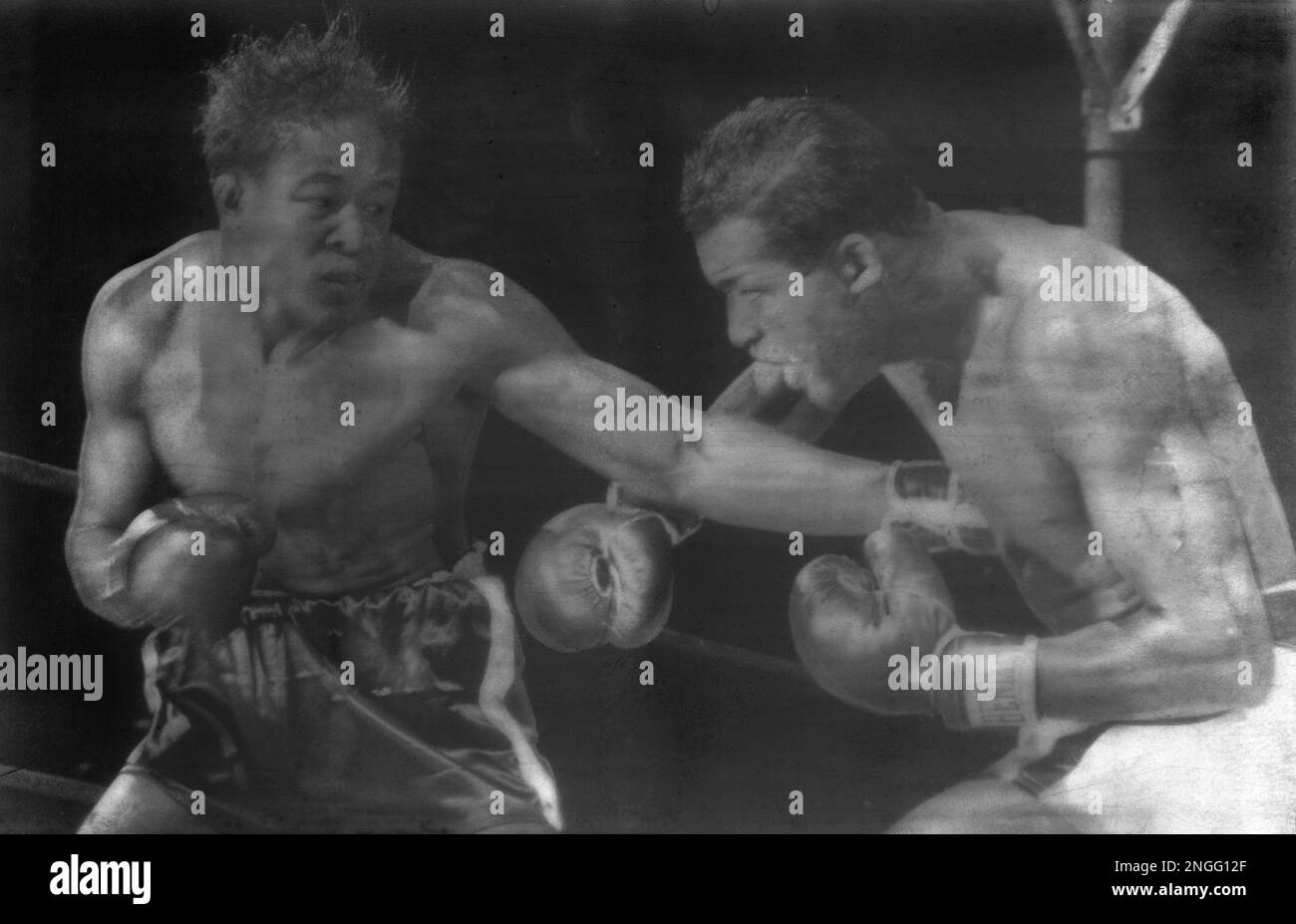 Welterweight Champion Sugar Ray Robinson, right, and Kid Gavilan fight ...