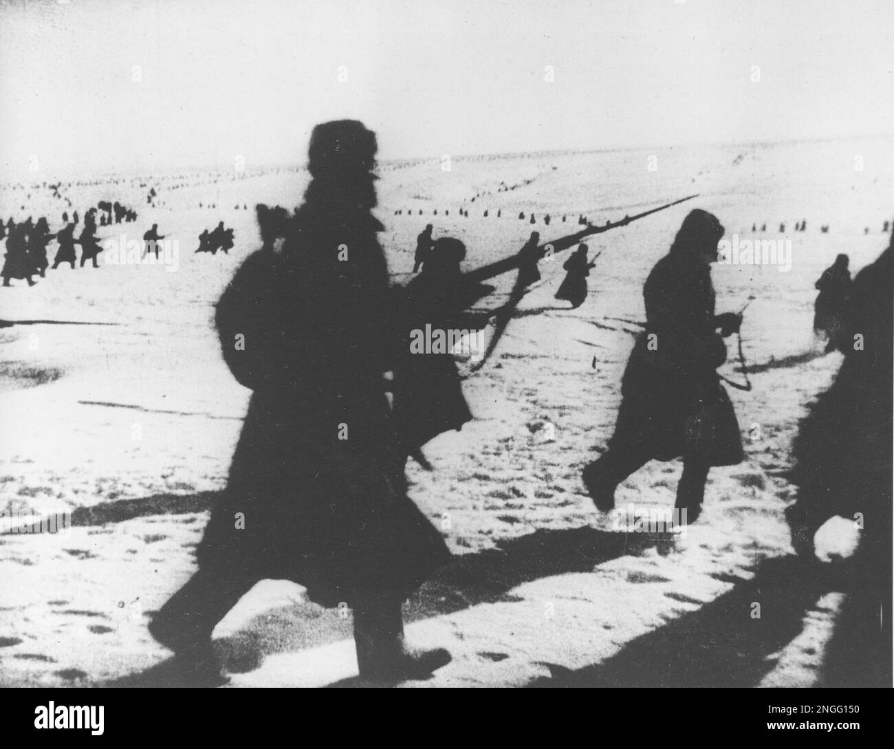 Soviet infantrymen move across snow-covered hills around Stalingrad, on ...