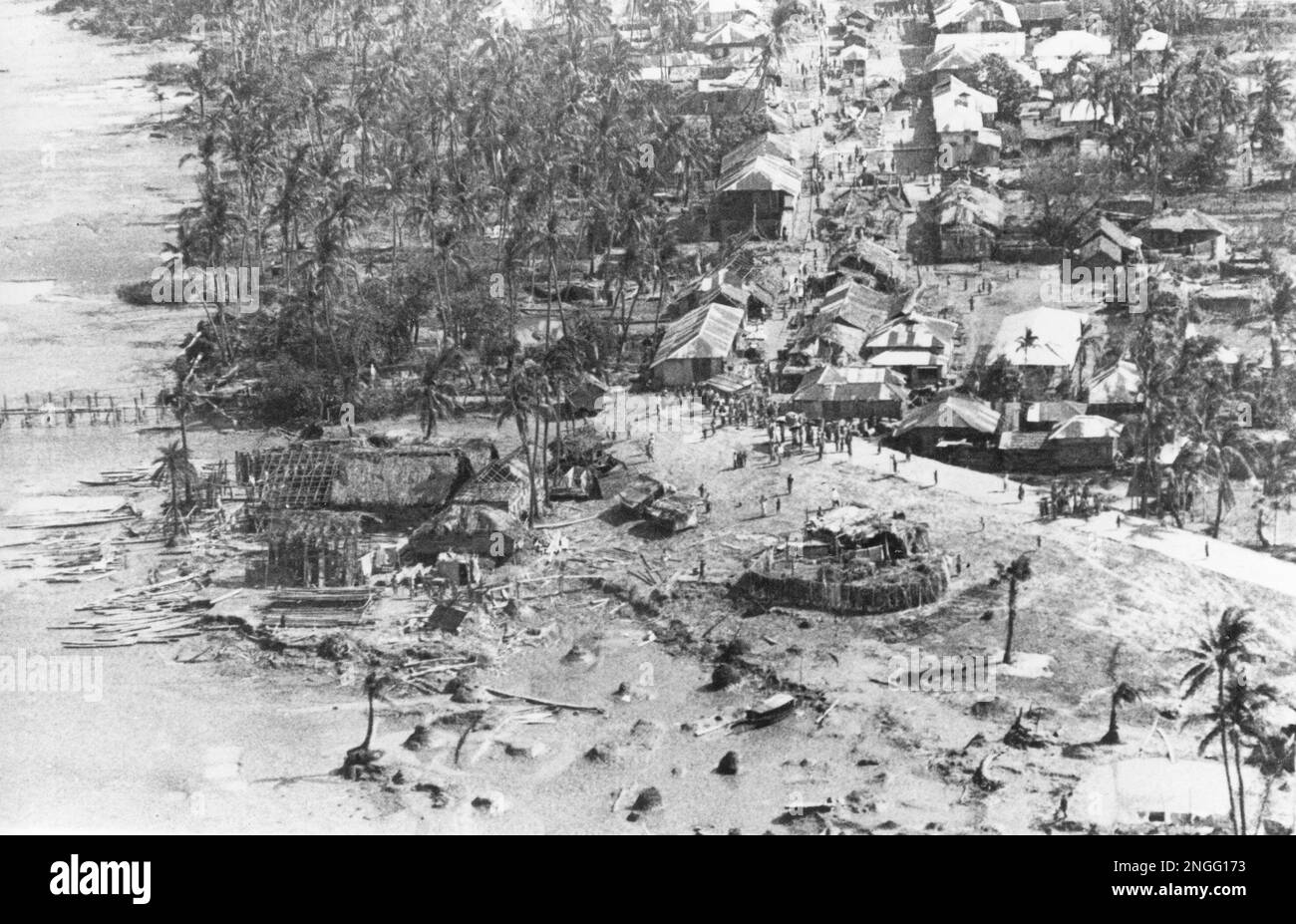 This aerial view shows the devastation in a hamlet on Manpura, East ...