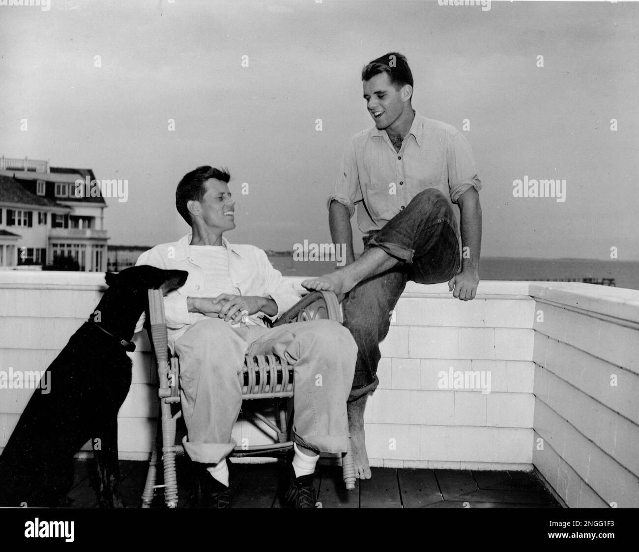 John F. Kennedy, left, is shown with his brother, Robert Kennedy, and ...