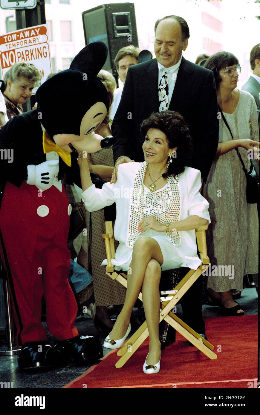 Former "Mouseketeer" Annette Funicello shares a moment with Mickey ...