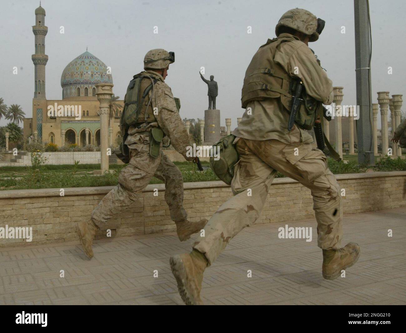 U.S. Marines of the 3rd Battalion, 4th Regiment take positions in a ...