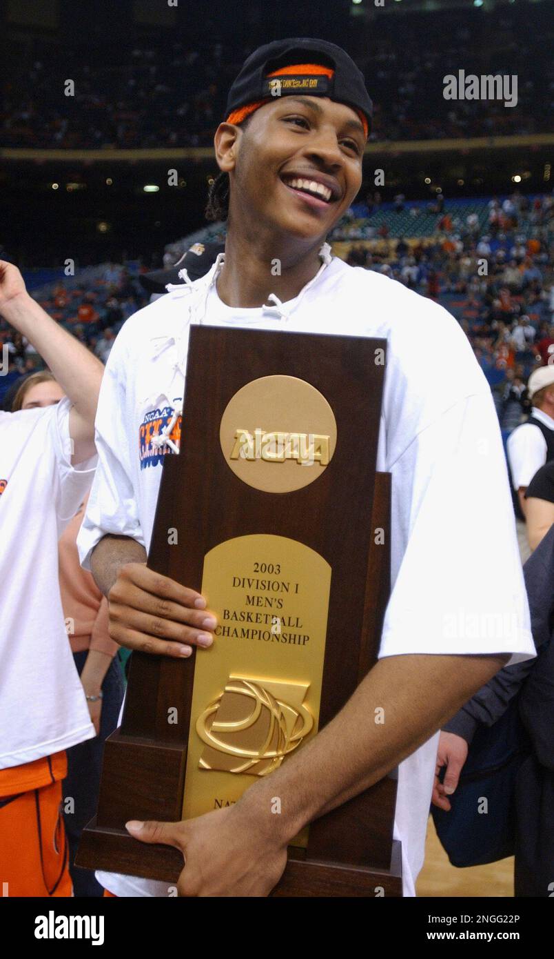 Syracuse's Carmelo Anthony holds the national championship trophy after ...