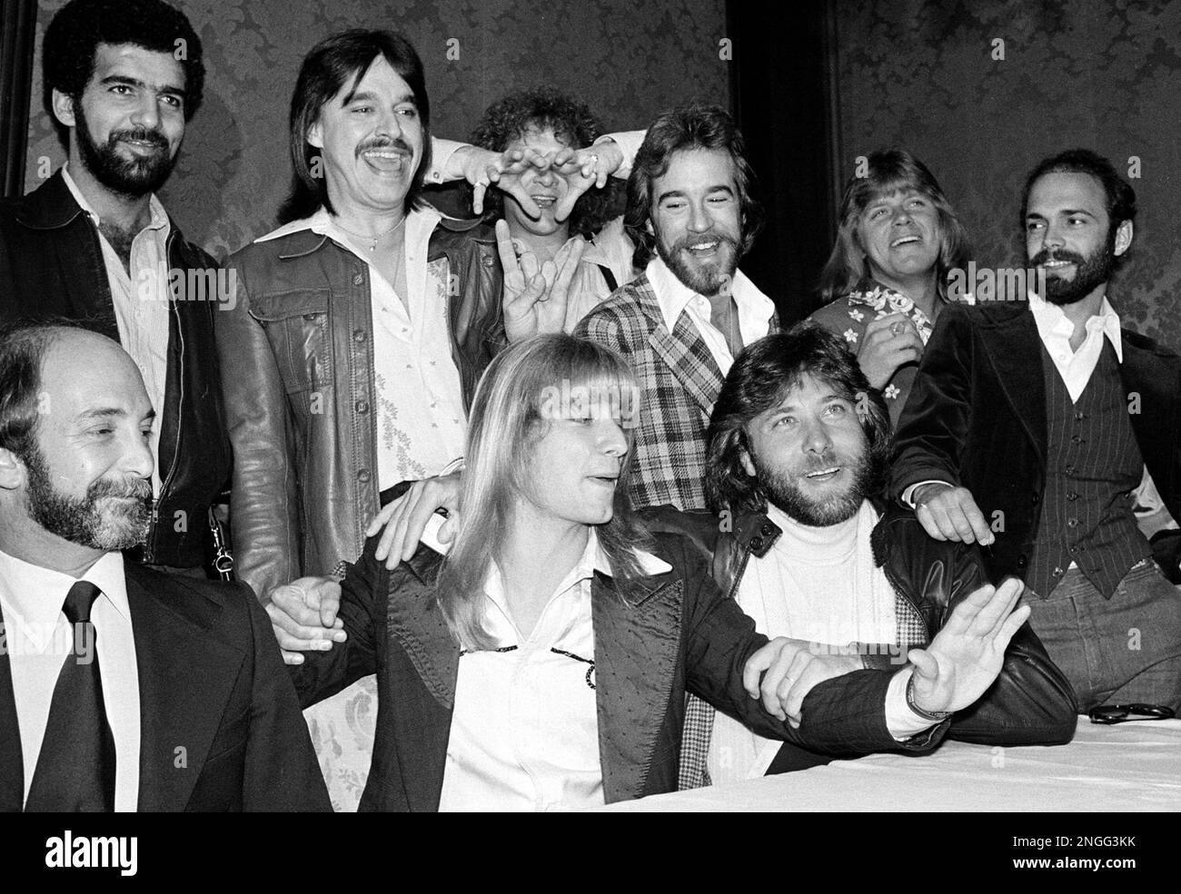 Donnie Dacus, front row center, is introduced as the new lead guitarist ...