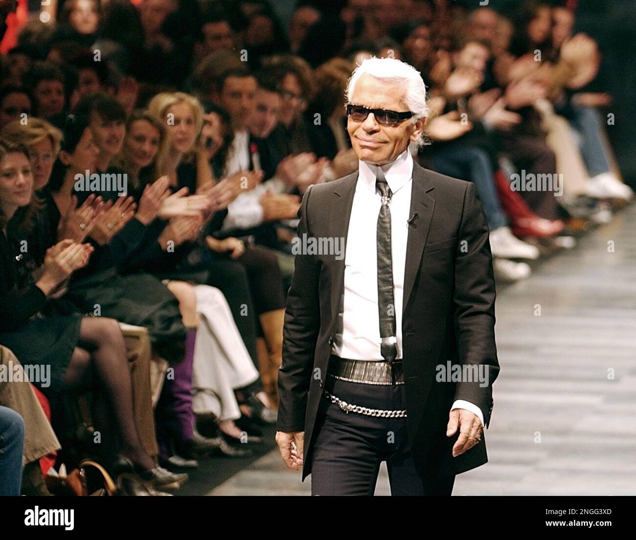 German fashion designer Karl Lagerfeld acknowledges applause after the ...