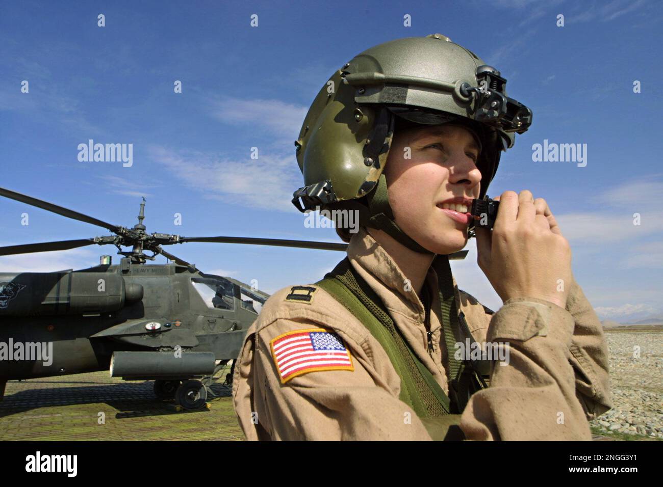 U.S. Army Captain Kellie Keller adjusts her helmet as she walks away ...