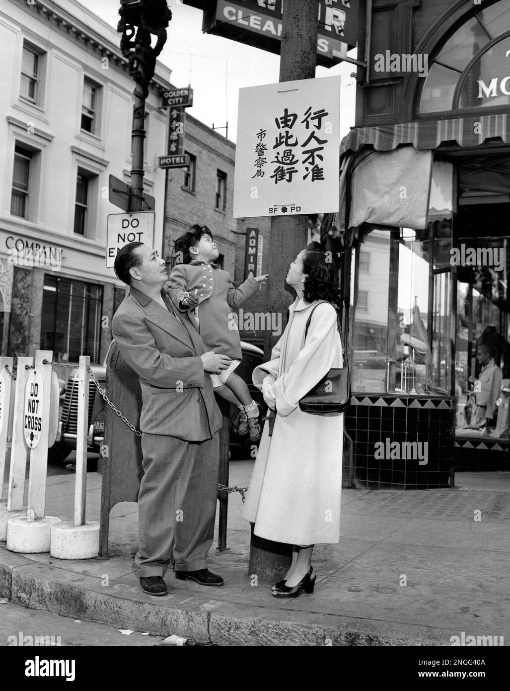 Mr. and Mrs. Sing Wong and their four-year-old daughter Wendy read the ...