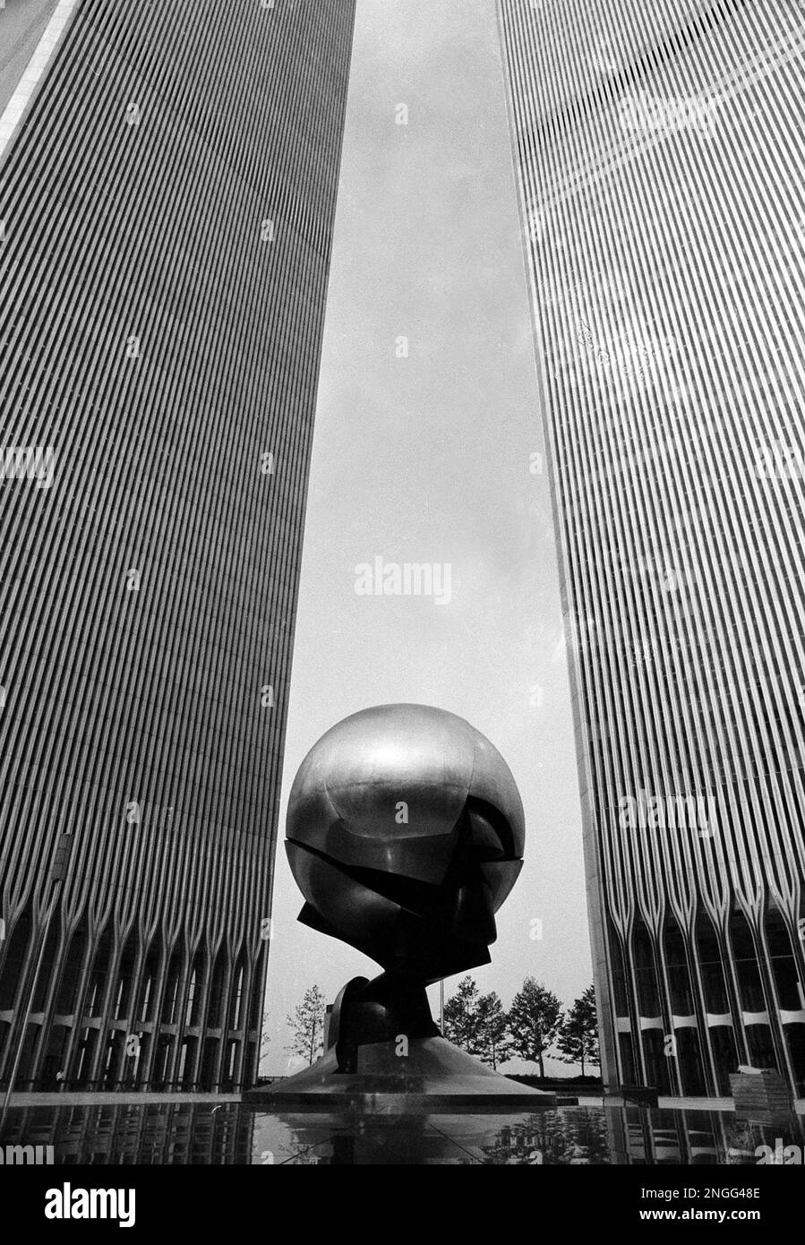 Framed by the twin towers of the World Trade Center, the spherical ...