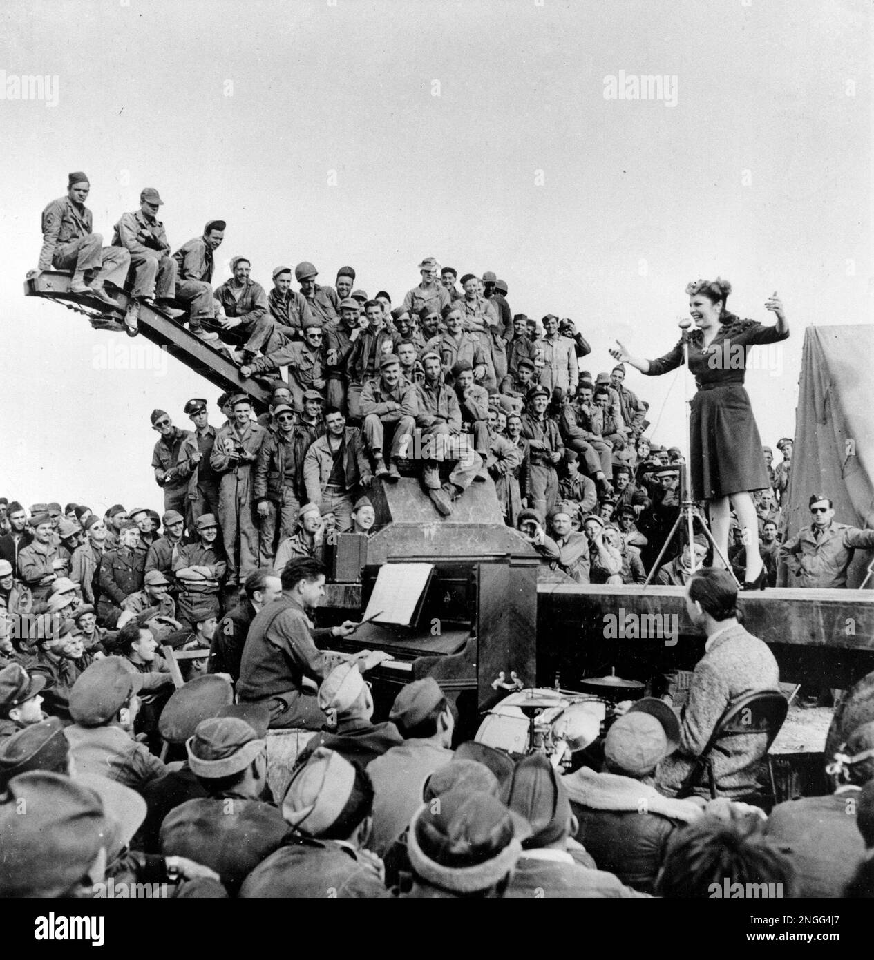 Actress-comedian Martha Raye entertains servicemen of the U.S. Army ...