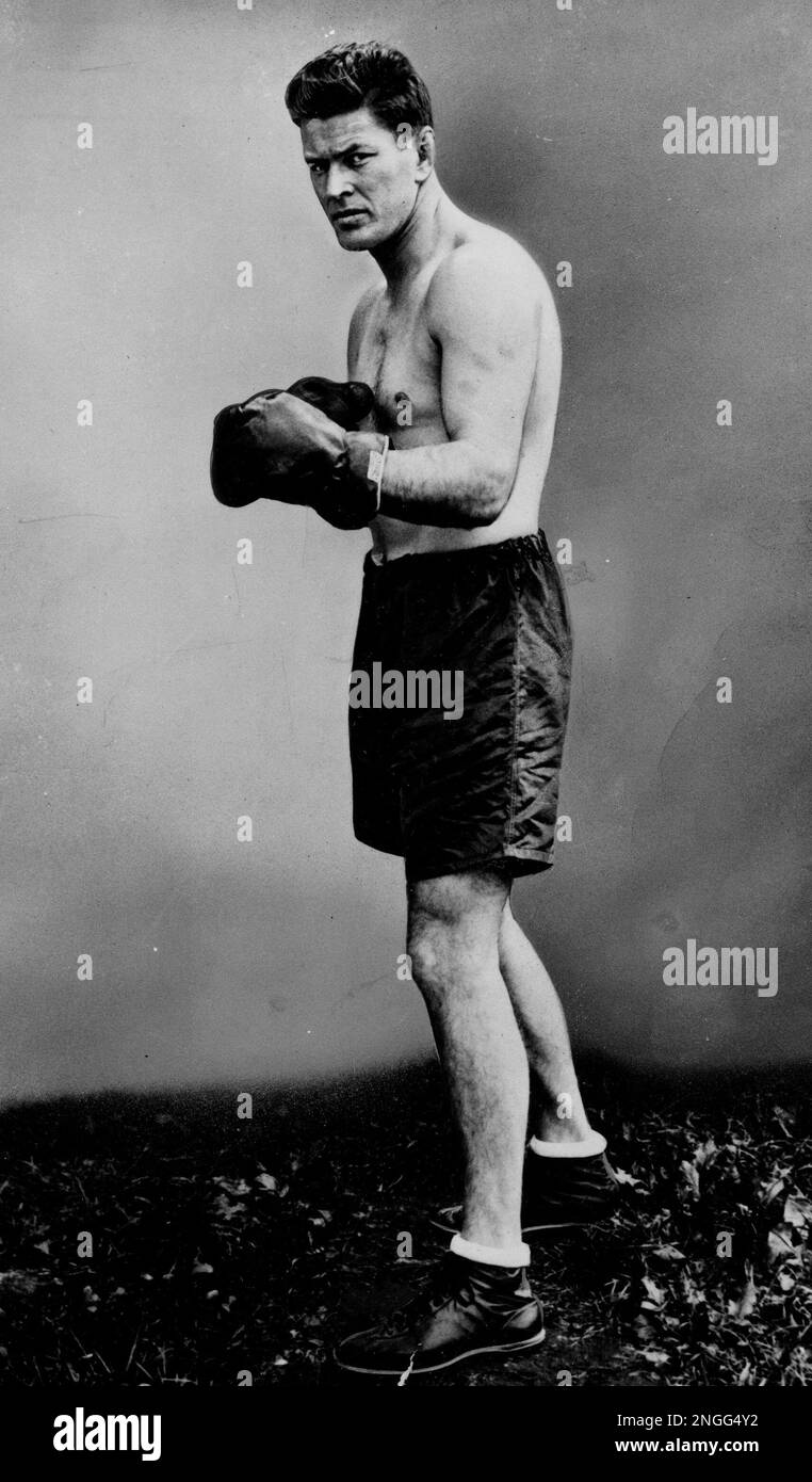 American boxing champ Gene Tunney strikes a pose after training for his ...