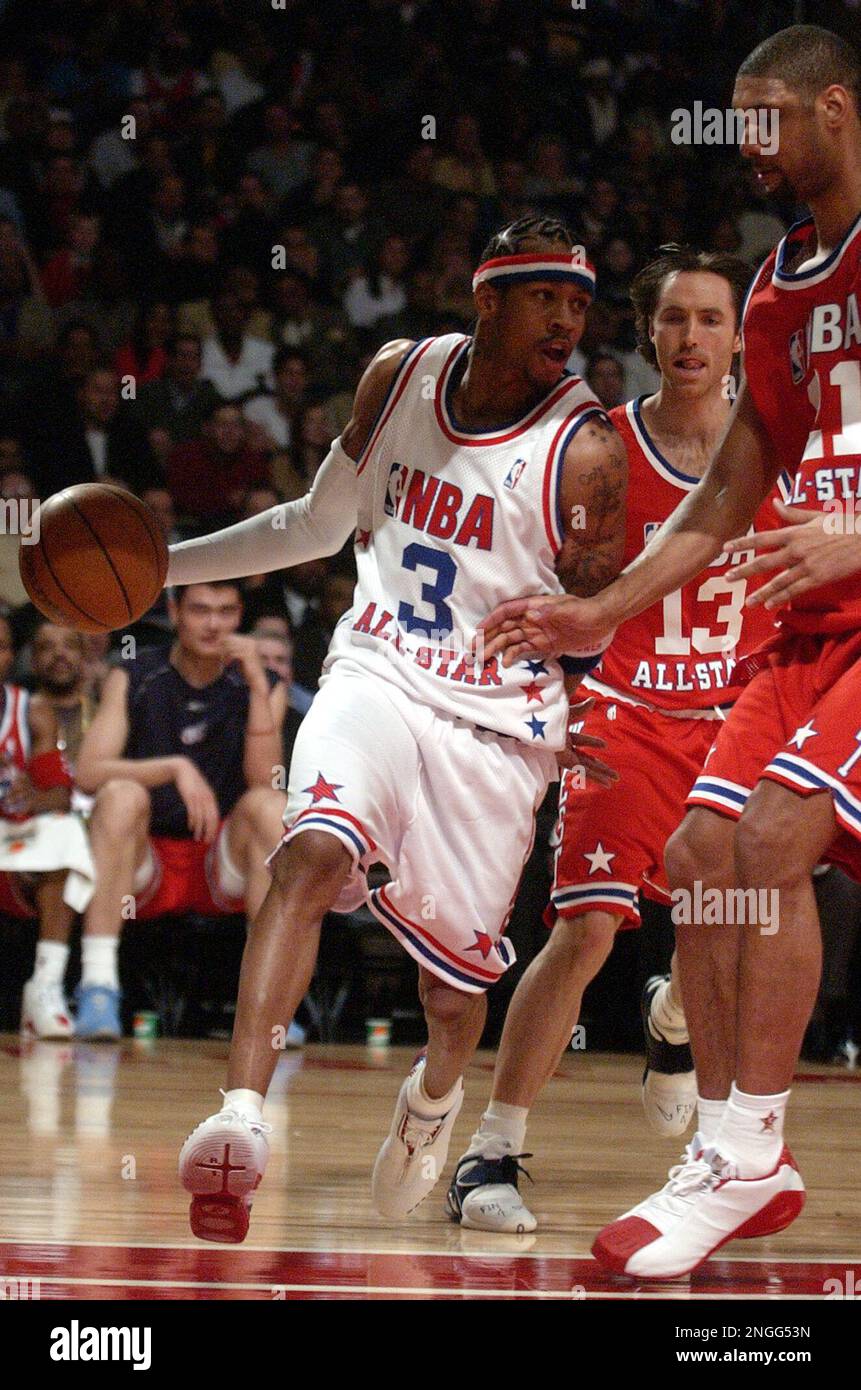 Philadelphia 76ers' Allen Iverson (3), East, drives past Dallas ...