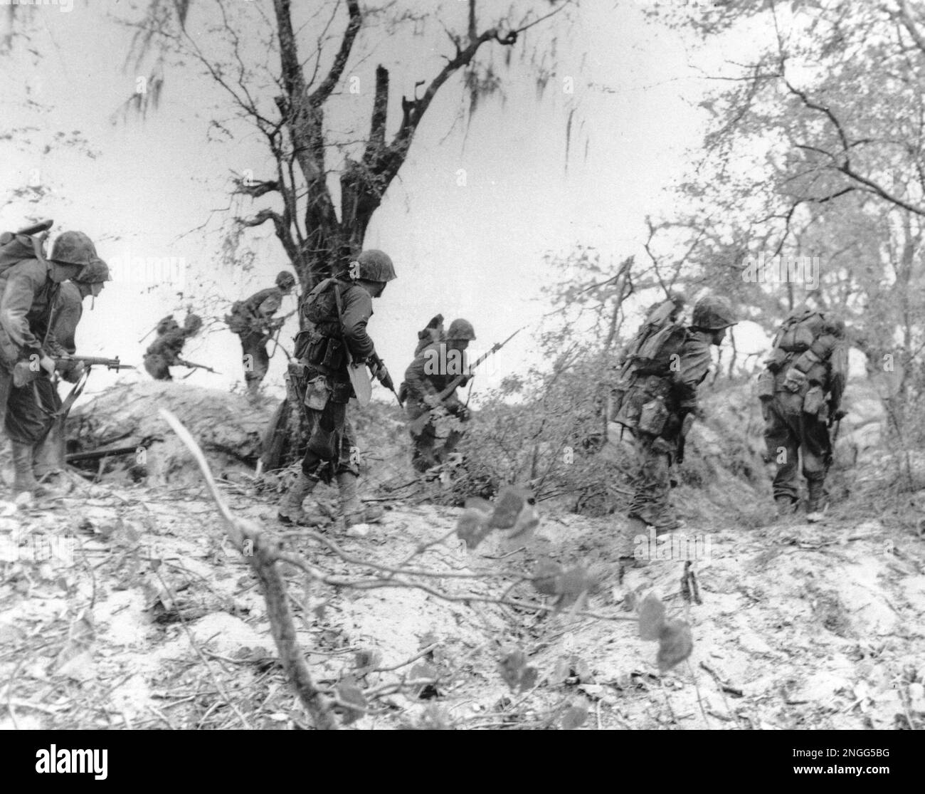 The invasion of the Mariana Islands continues, U.S. Marines are seen on ...