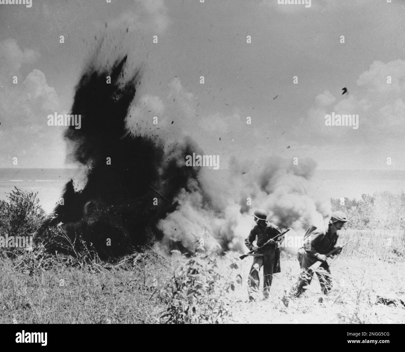 In this photo provided by the U.S. Marine Corps, U.S. Marines walk away ...