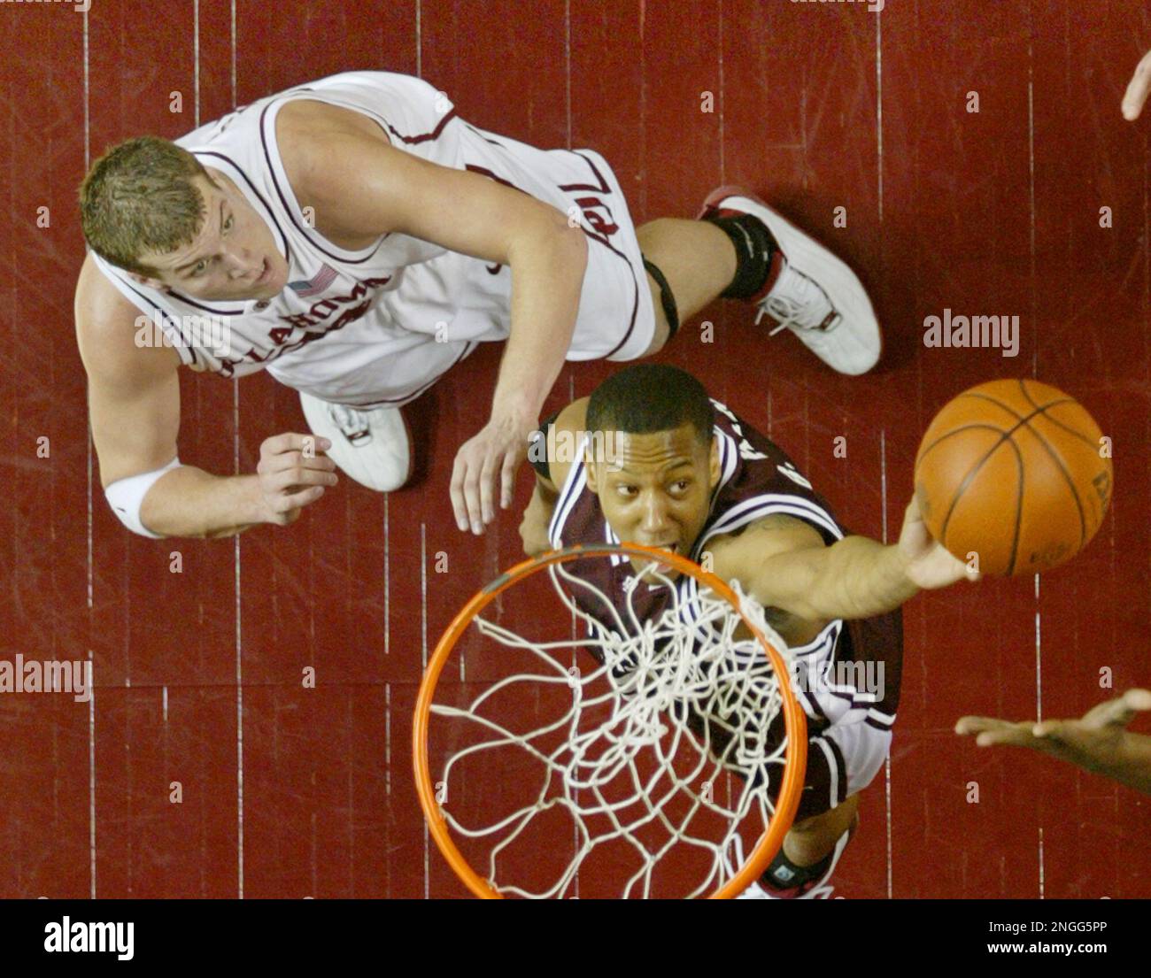 Texas A&M guard Bernard King, right, goes up for a shot in front of ...
