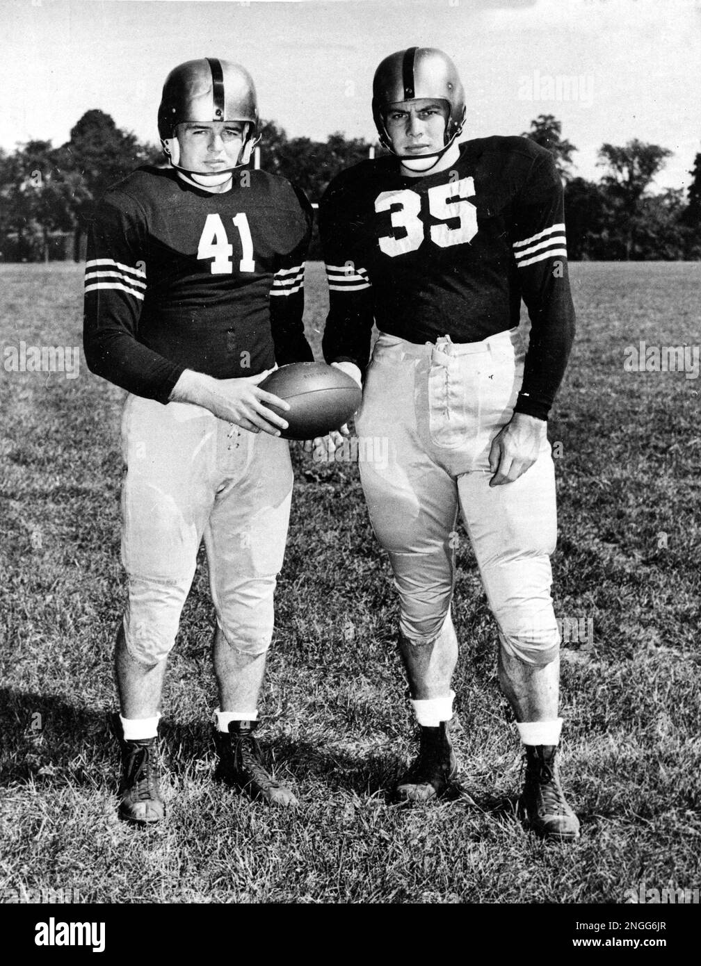 Glenn Davis (41) and Felix "Doc" Blanchard (35), Army backs, are shown ...
