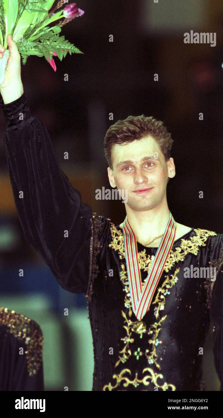 Gold medalist Victor Petrenko from Ukraine waves to the spectators ...