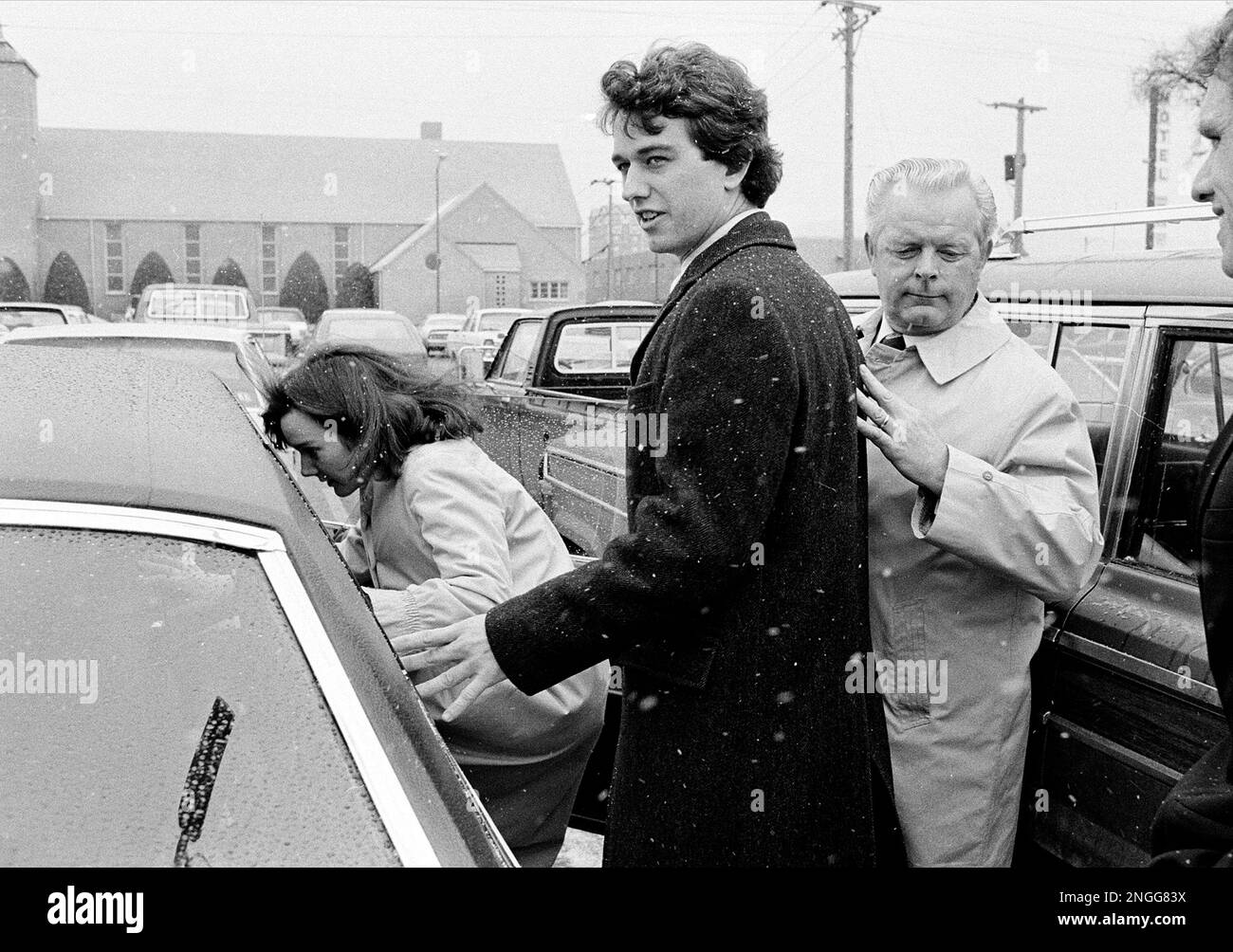 Robert Kennedy Jr. and his wife, Emily, climb into a car as they are ...