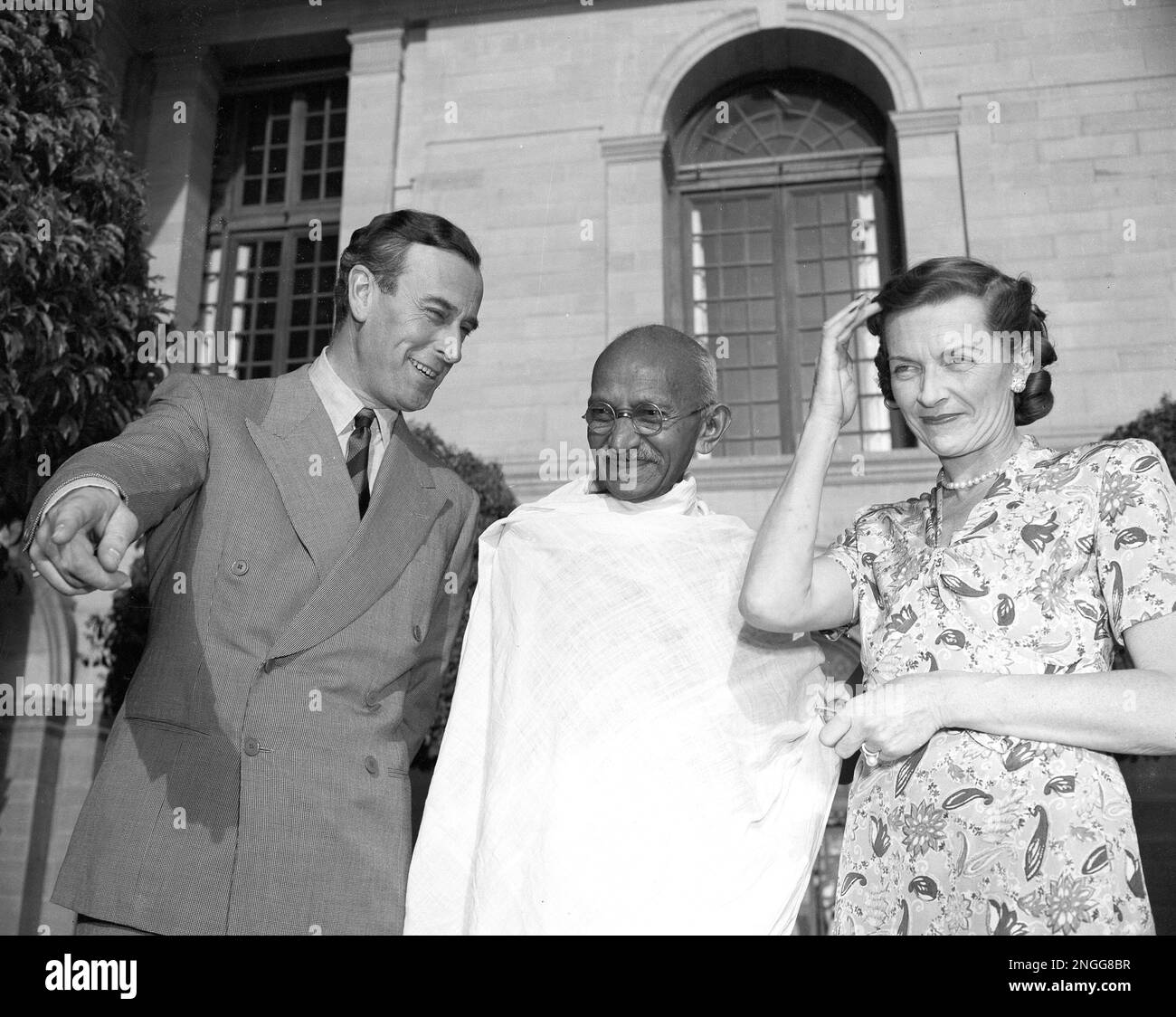 Lord and Lady Mountbatten are seen with Mahatma Gandhi, center, in the ...