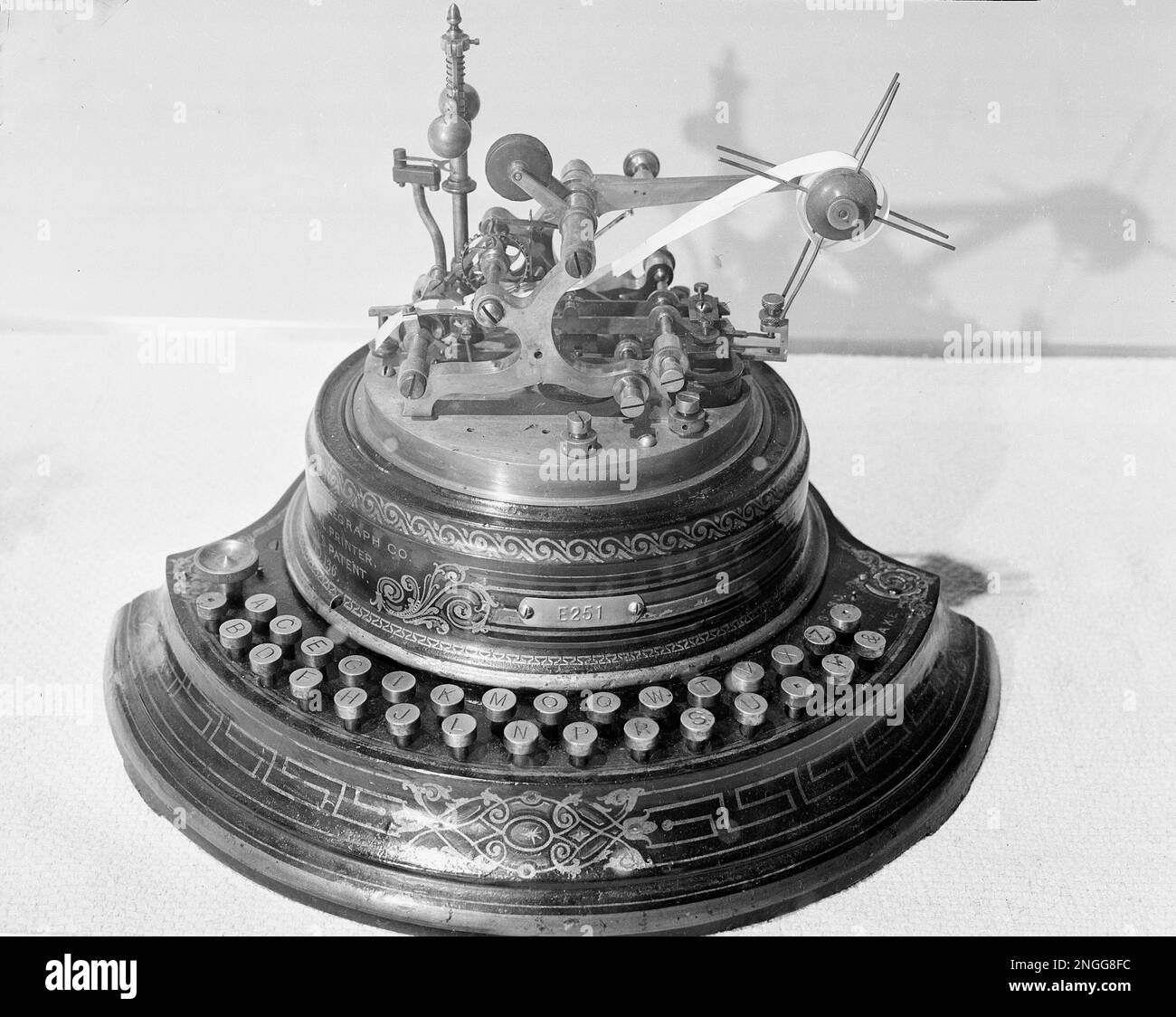Thomas Edison's early model of the Universal Stock ticker is shown in ...