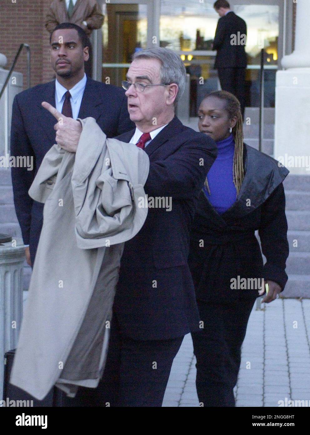 Former NBA player Jayson Williams, rear left, along with his attorney ...