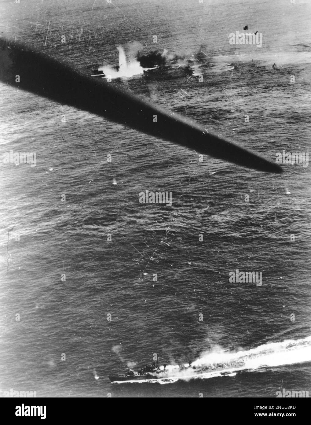 A Japanese aircraft-carrier is attacked by U.S. torpedoes, off the ...