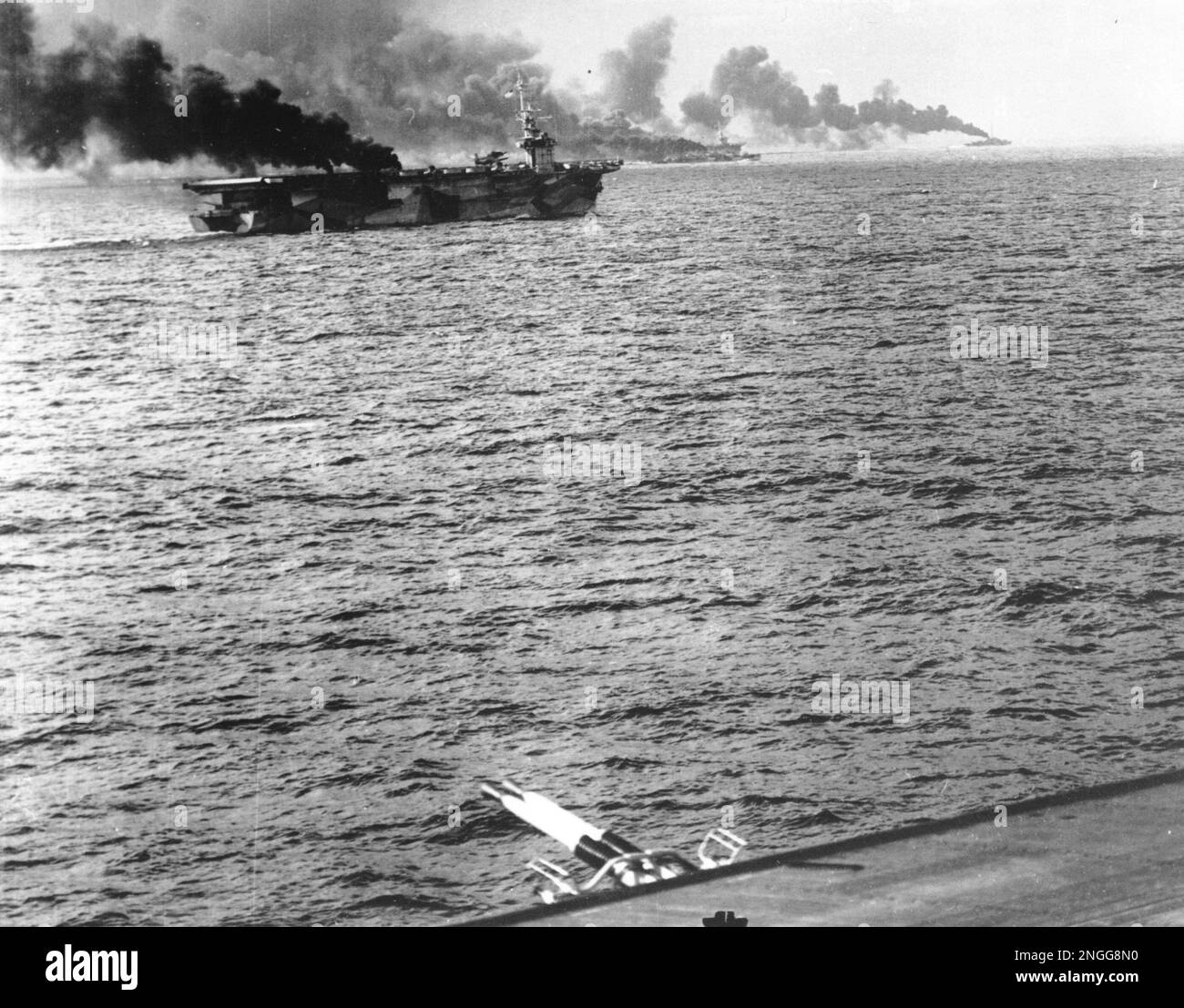 Seen from the USS St Lo, partially in the foreground, ships of the U.S ...