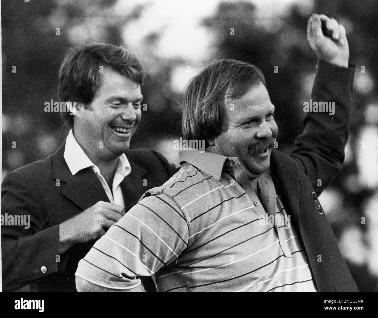 Craig Stadler, right, winner of the Masters Golf Tournament, receives ...