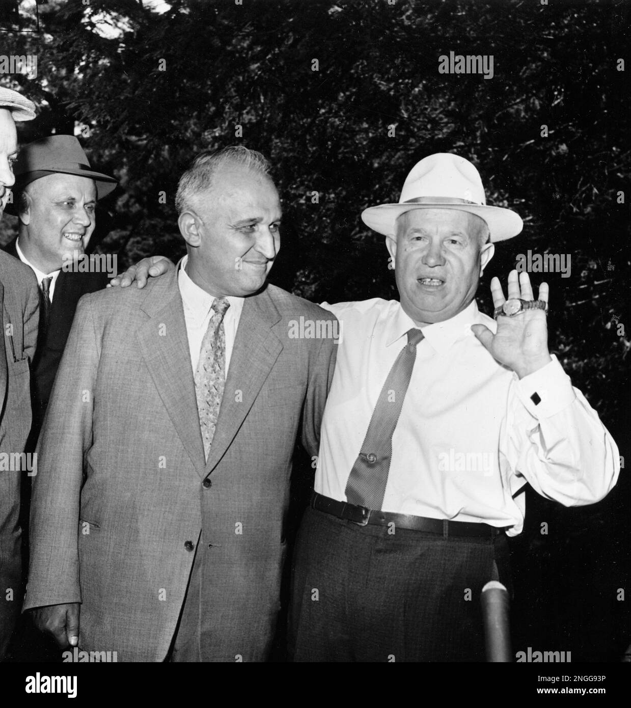 Soviet Premier Nikita Khrushchev holds his wrist watch around his hand ...