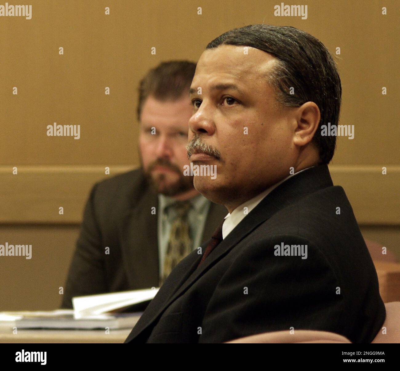 Anthony Taylor, 43, front, faces a charge of aggravated assault with a ...