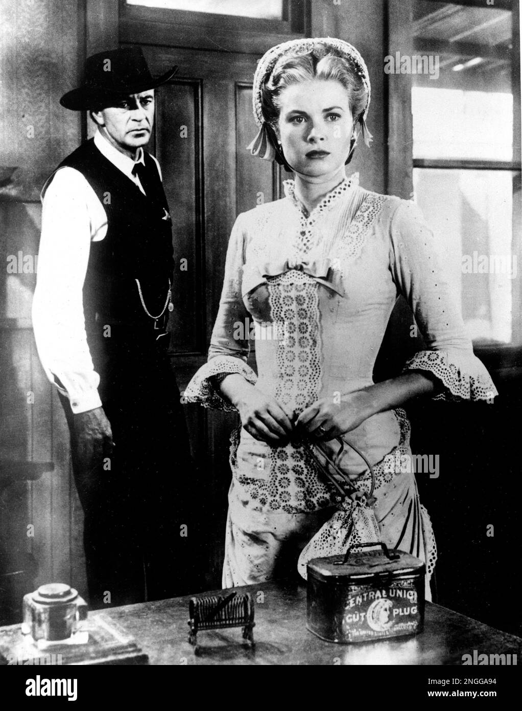 Gary Cooper and Grace Kelly are shown in a scene from "High Noon" on ...
