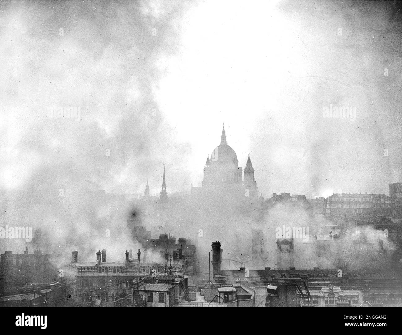 Smoke and flames from neighboring buildings surround St. Paul's ...
